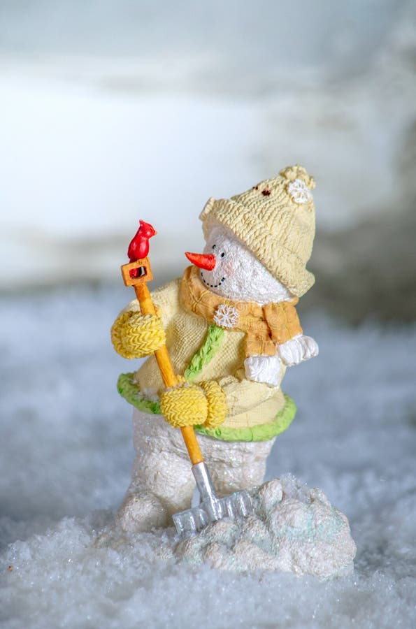 Snowman with a Cardinal Shoveling Snow Stock Image - Image of season ...