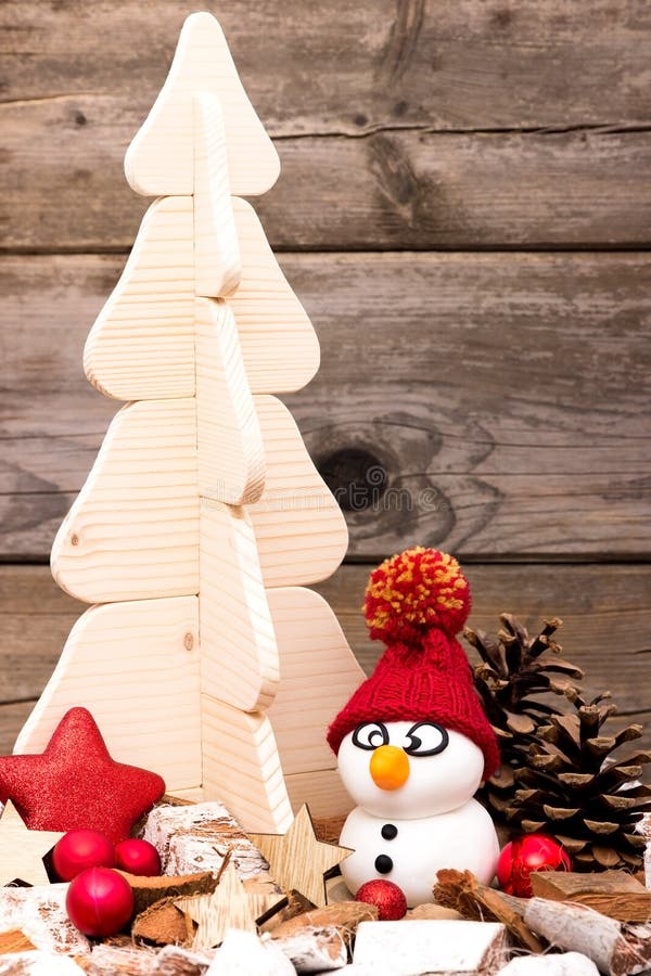 Toy Snowman Next To a White Christmas Tree Stock Photo - Image of ...