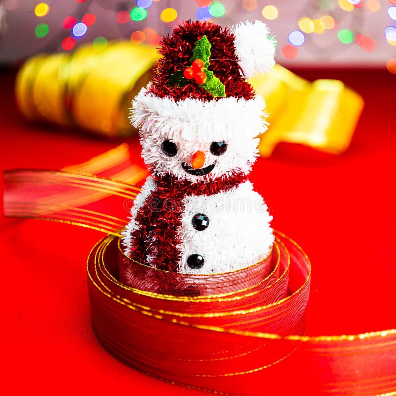Snowman Decoration Covered with Red Festive Ribbon Stock Photo - Image ...