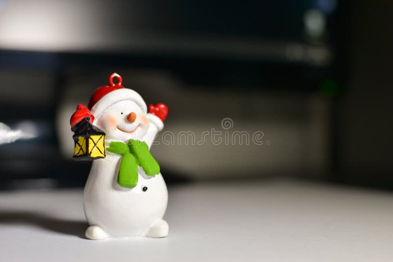 Snowman on the Desktop in Front of the Computer Stock Photo - Image of ...