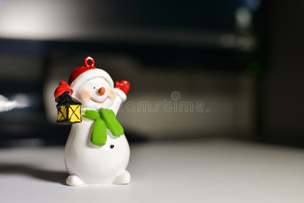 Snowman on the Desktop in Front of the Computer Stock Photo - Image of ...