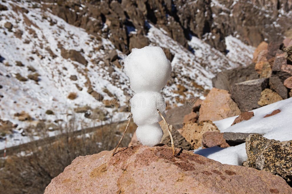 Snowman Doing a Headstand stock photo. Image of snowman - 209542056