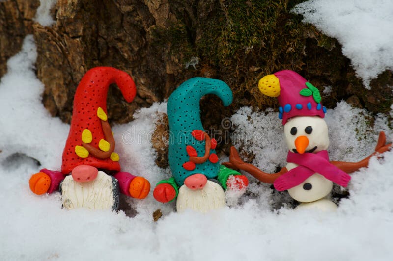 Snowman and Dwarf Figures in the Winter Forest Stock Photo - Image of ...