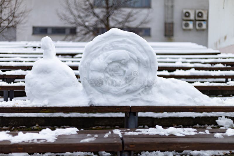 Snowman in the Form of a Snail Made of Snow Stock Photo - Image of ...