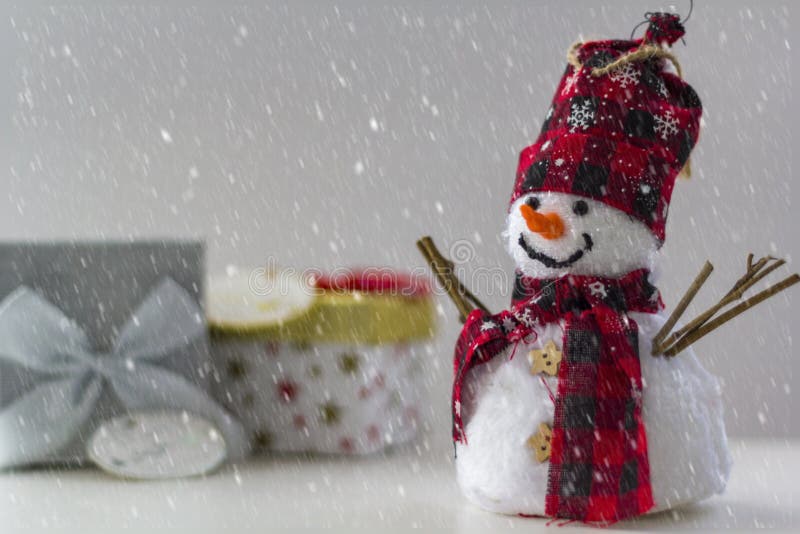 Snowman with Gift Boxes on the Background and Snow Stock Photo - Image ...