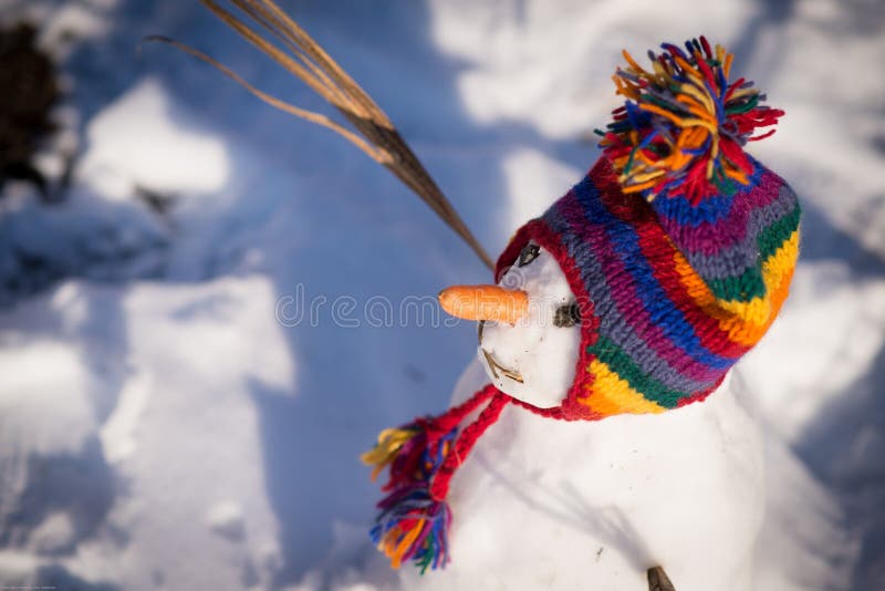 Snowman looking at the sun stock image. Image of warmth - 48567873