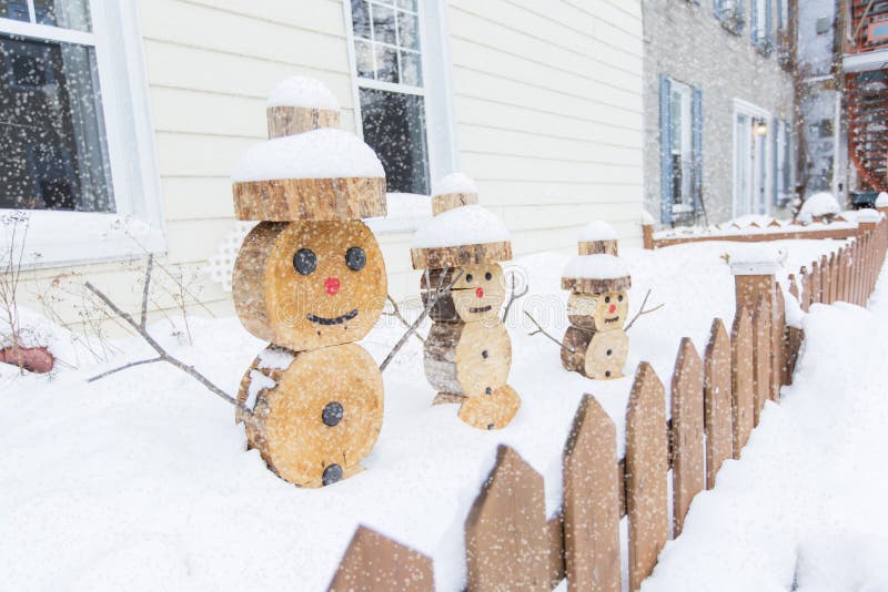 Snowman Made in Piece of Wood with Fence on the Front Stock Image ...