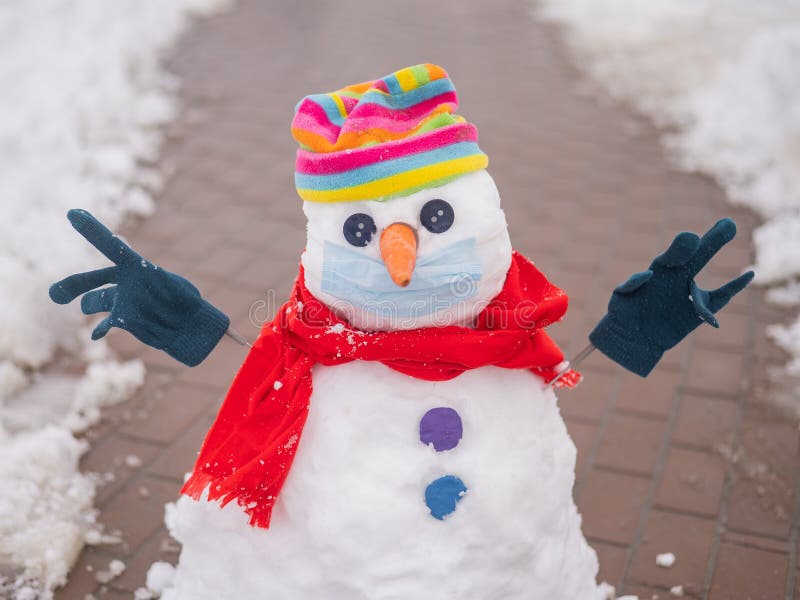 Snowman in a Rainbow-colored Hat and a Medical Mask. Stock Image ...