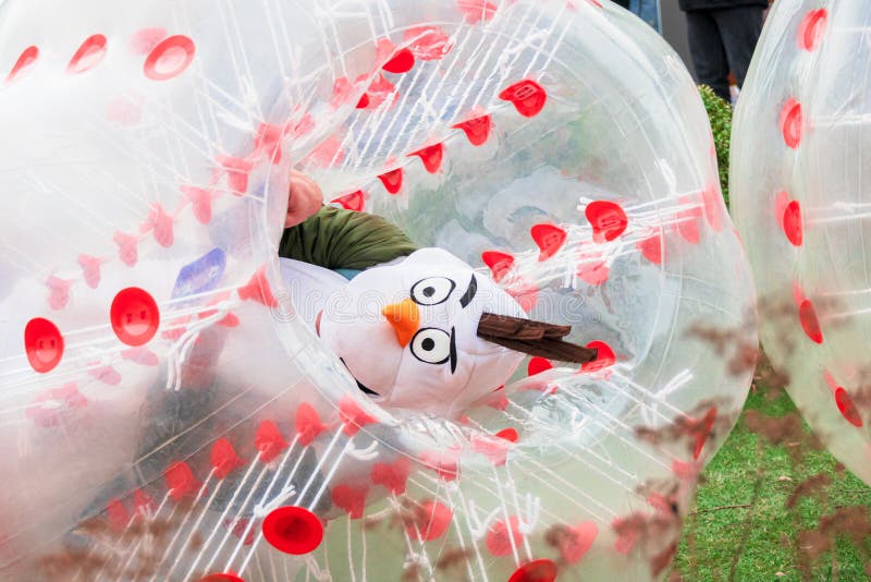 Snowman Rides in an Inflatable Orb Stock Image - Image of bumper ...