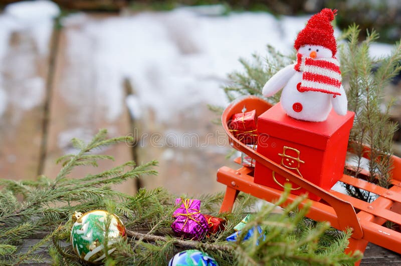 Snowman on a sled stock photo. Image of gift, christmas - 46177604