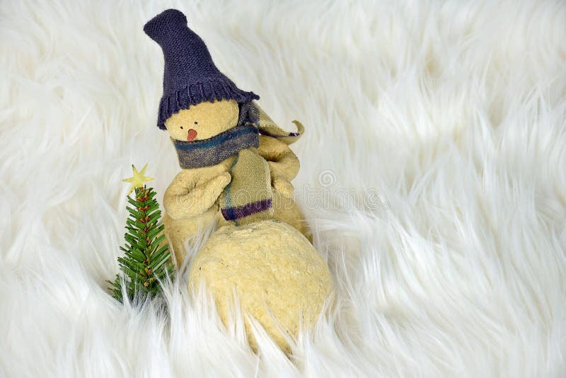 Snowman with Snowball in Fur Stock Photo - Image of ball, macro: 80690242