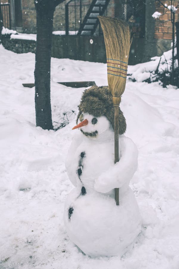 Snowman in the yard stock image. Image of holiday, snow - 51487371