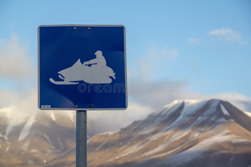 Snowmobile Blue Road Sign in the Mountains Stock Photo - Image of ...