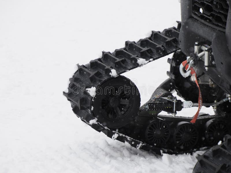Snowmobile Snowmobile Caterpillar Detail on the Snow Stock Photo ...