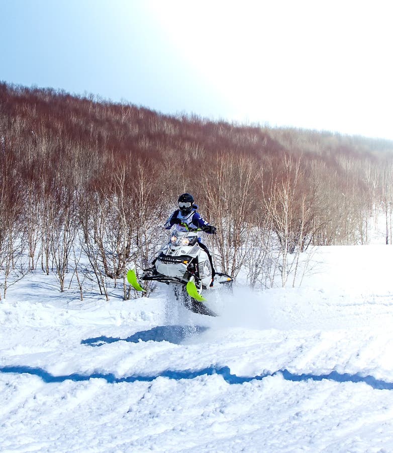 Snowmobile in High Jump Above Track Stock Photo - Image of deep ...