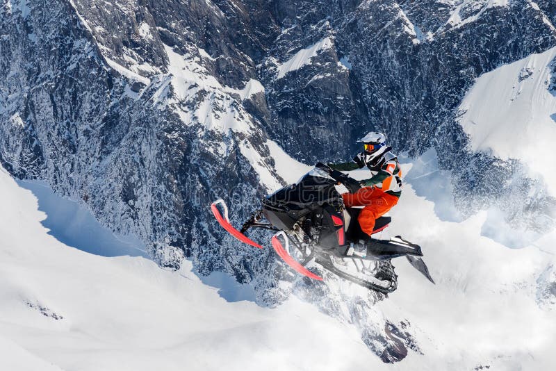 Jump with snowmobile stock photo. Image of sled, clear - 177134646
