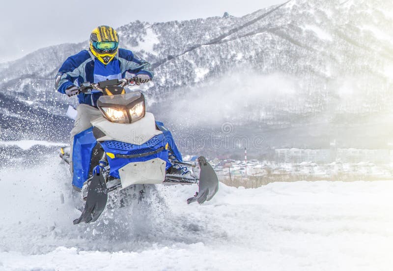 Snowmobile on the Route in a Jump in Air in Kamchatka Stock Photo ...