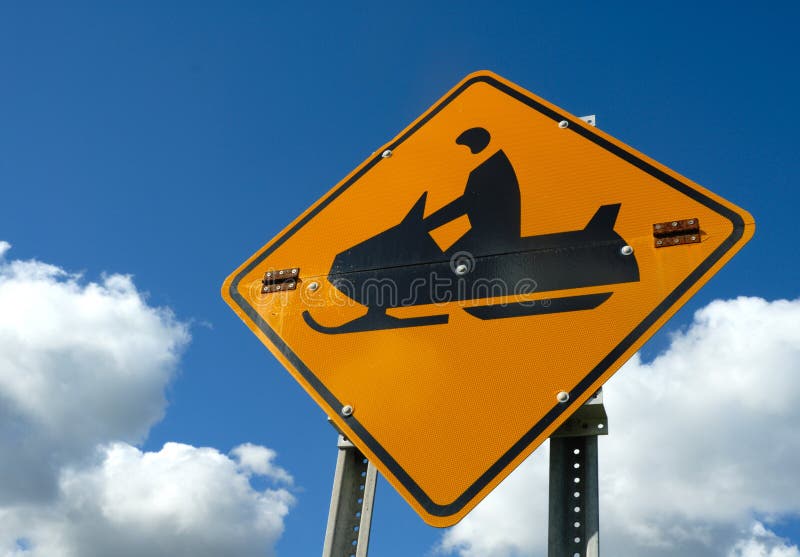 Snowmobile sign. stock photo. Image of snowmobiler, crossing - 8760600
