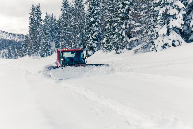 Snowmobile at work stock photo. Image of cold, wintry - 215009506