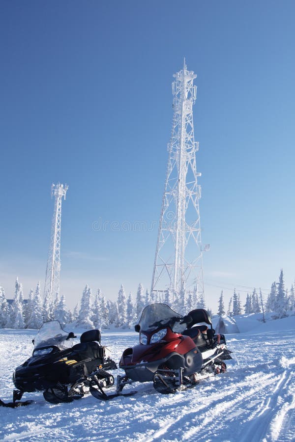 Snowmobiles and Communication Equipment in Forest Stock Image - Image ...