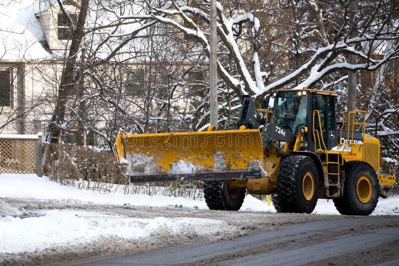 Snowplow sweeps the snow editorial photography. Image of bulldozer ...