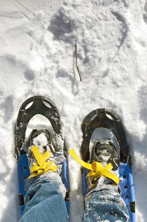 Snowshoeing stock image. Image of blue, winter, jeans - 1854621