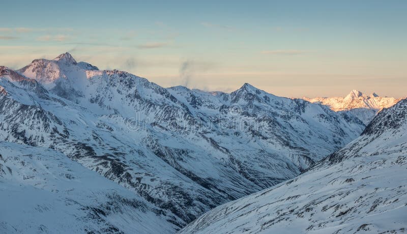 Snowy Alps at dusk stock image. Image of senales, mountains - 68654405