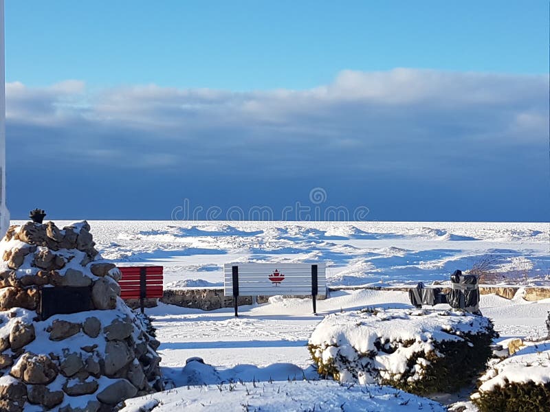 Snowy beach stock image. Image of frozen, february, water - 135804483