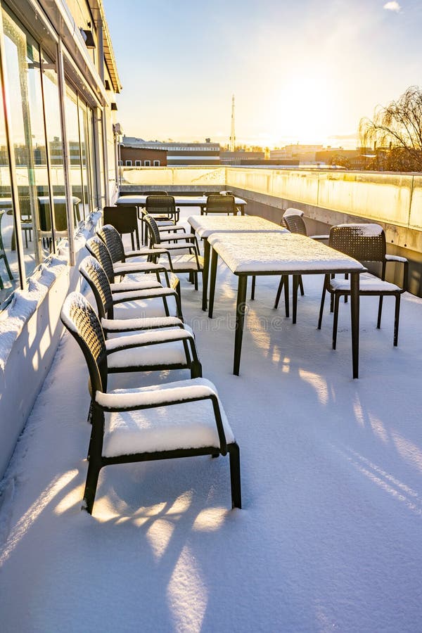 Snowy Chairs on a Roof Terrace in Winter.. Stock Image - Image of snowy ...