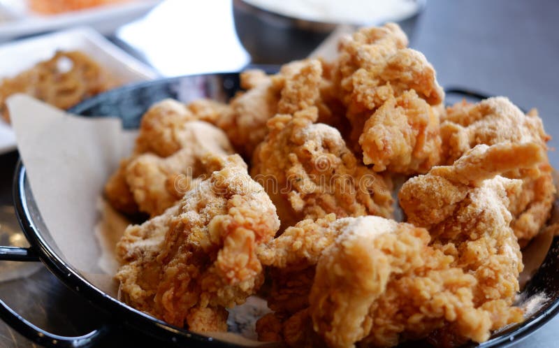 Snowy Cheese Korean Fried Chicken on a Black Plate. Stock Image - Image ...
