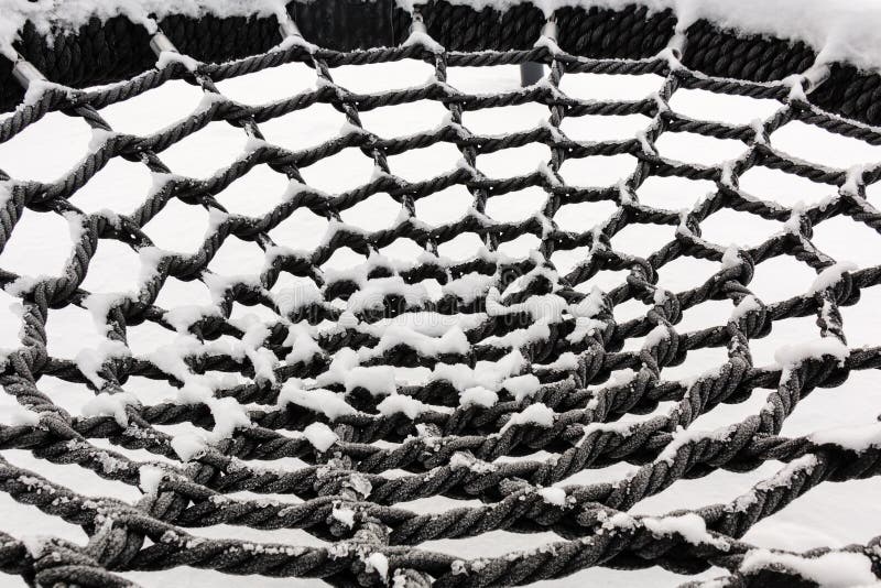 Snowy Circular Rope Netting Stock Image - Image of winter, snowy: 67230765