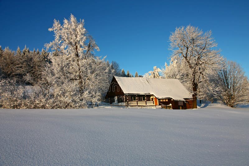 A Traditional Czech Cottage is Nestled in a Pristine, Snow-covered ...