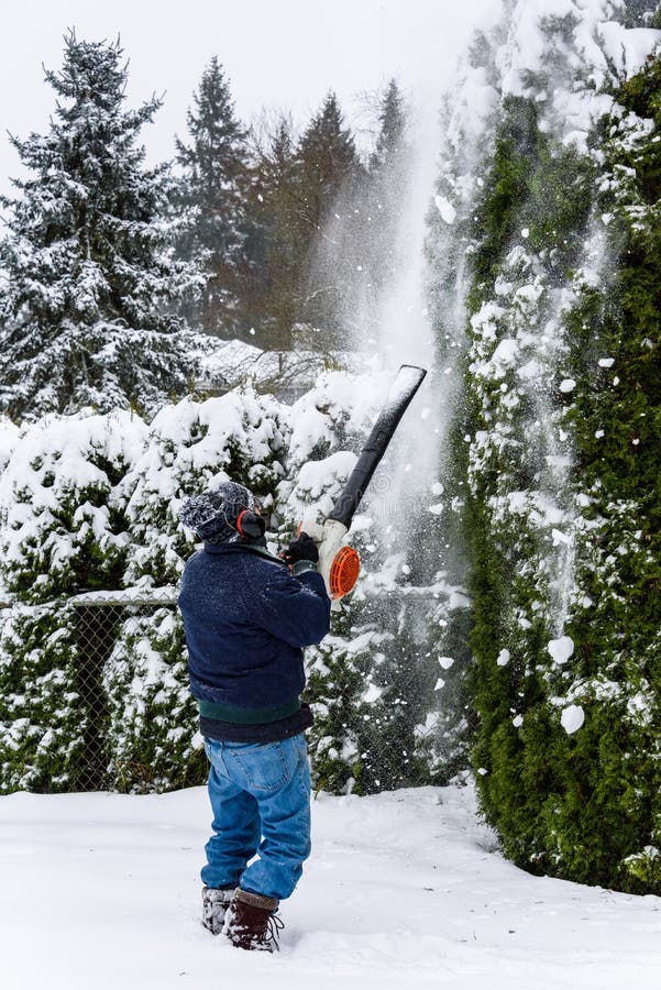 Man Using a Snow Blower editorial photography. Image of precipitation ...