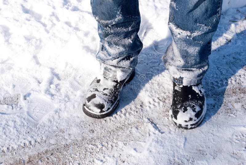 Snowy Feet stock photo. Image of winter, jeans, legs - 22952960
