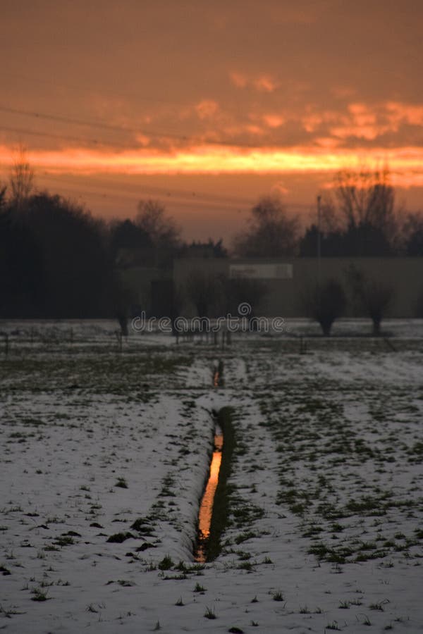Icy field at sunset stock image. Image of middle, sundown - 101385191