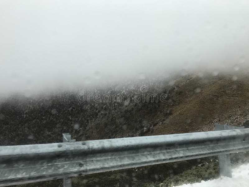 Snowy fog stock photo. Image of mountaintop, snowy, australia - 107158564