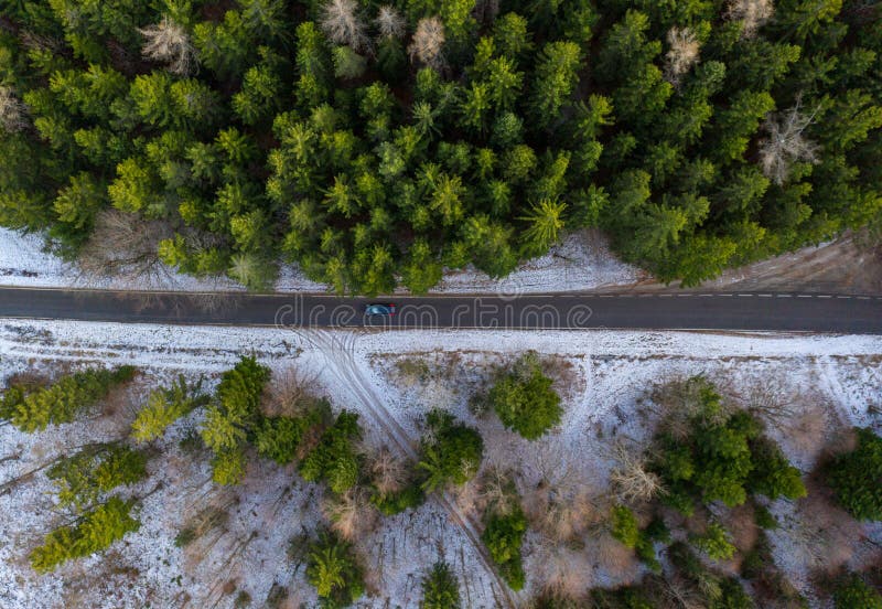 Snowy Forest with a Road Captured from Above with a Drone Stock Photo ...