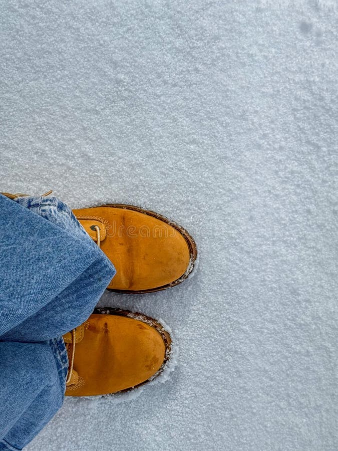 Snowy Ground View with Yellow Boots in a Winter Landscape Stock Photo ...