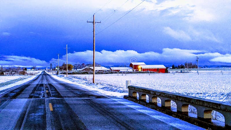 Snowy icy road on the farm stock photo. Image of road - 177123476