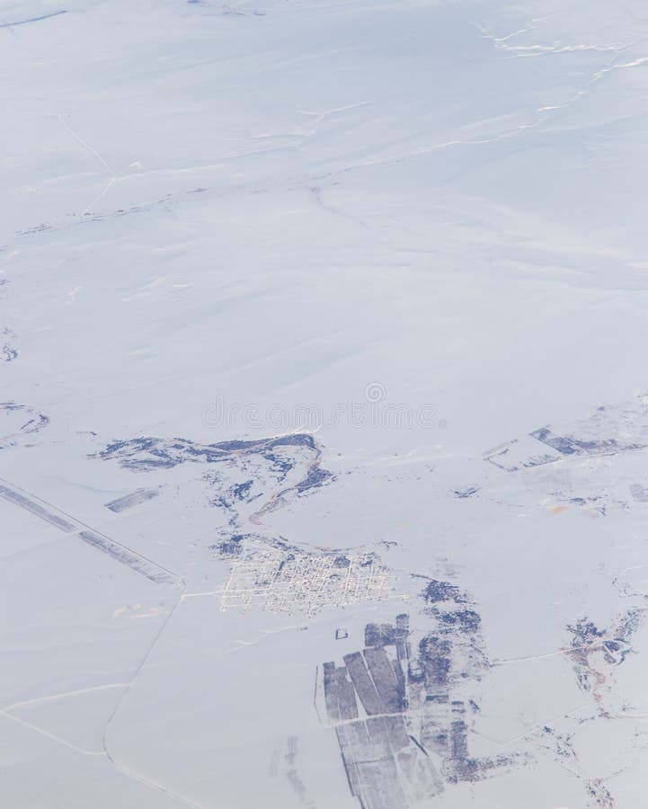 Snowy Land. View from the Airplane Stock Photo - Image of aerial ...