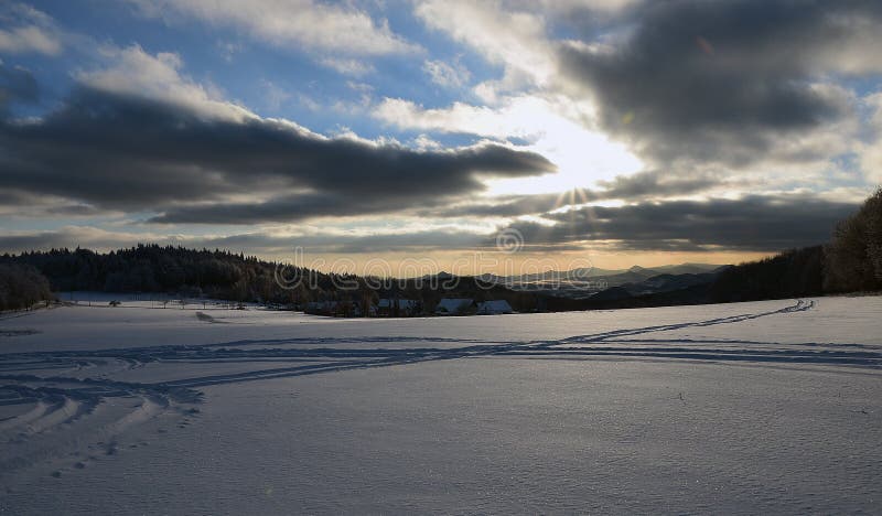 Snowy meadow in mountains stock image. Image of sunset - 69149475