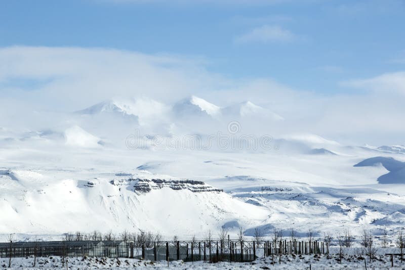 Snowy Mountain Landscape in Iceland Stock Photo - Image of snow, clouds ...