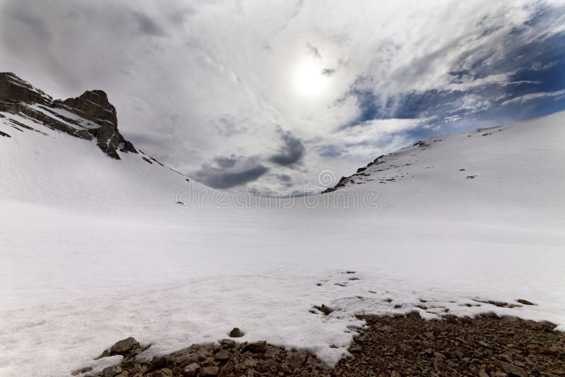 Snowy Mountain Pass and Sky with Clouds at Evening Stock Photo - Image ...