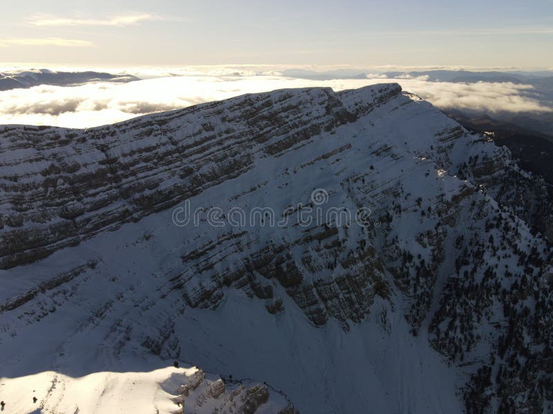 The Snowy Mountain Range in the Spanish Pyrenees with Light Clouds in ...