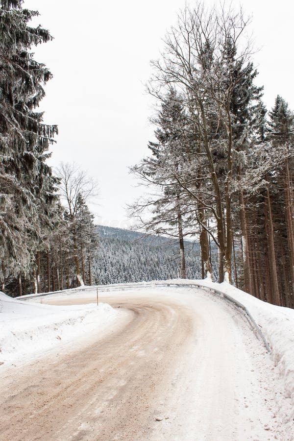 Snowy Mountain Road. Risk of Ice. Path in Snowy Woods. Stock Image ...