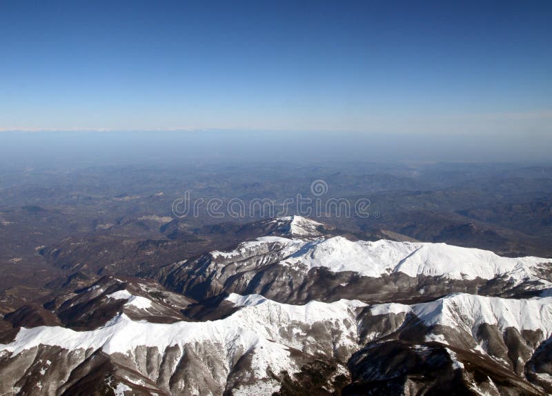 Snowy mountain tops stock photo. Image of scenic, peaks - 4673912