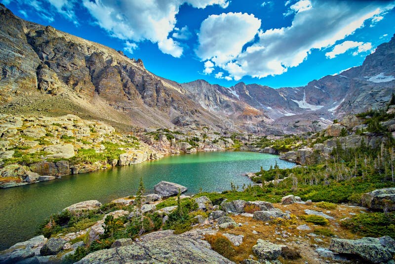 Snowy Mountains Surround Large Lake Stock Image - Image of range, snow ...