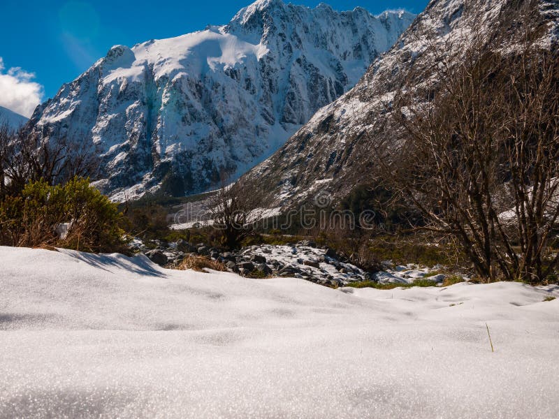 Snowy Mountains in the Wilderness with Blue Sky Stock Photo - Image of ...