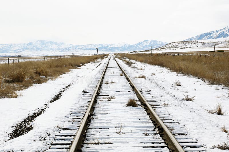 Snowy Railroad Tracks stock photo. Image of blue, snow - 54266700