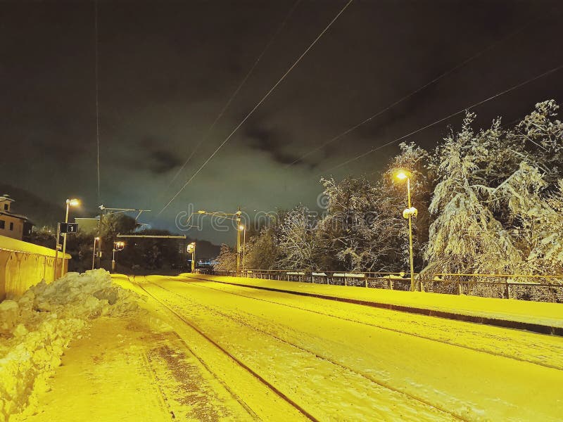 Snowy Railway Tracks Litt Up at Night Stock Photo - Image of autumn ...